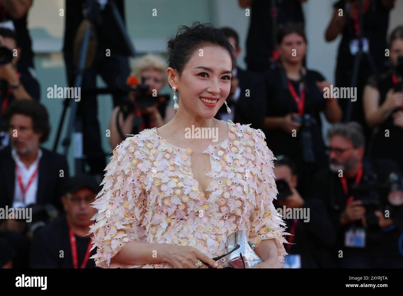 Venice, Italy, 30th August, 2024. Zhang Ziyi arriving on the red carpet ...