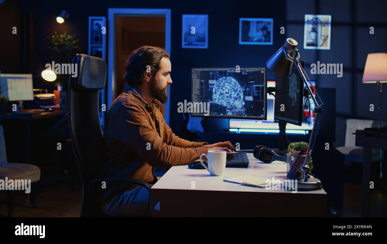 Freelancing computer scientist typing hi-res stock photography and ...