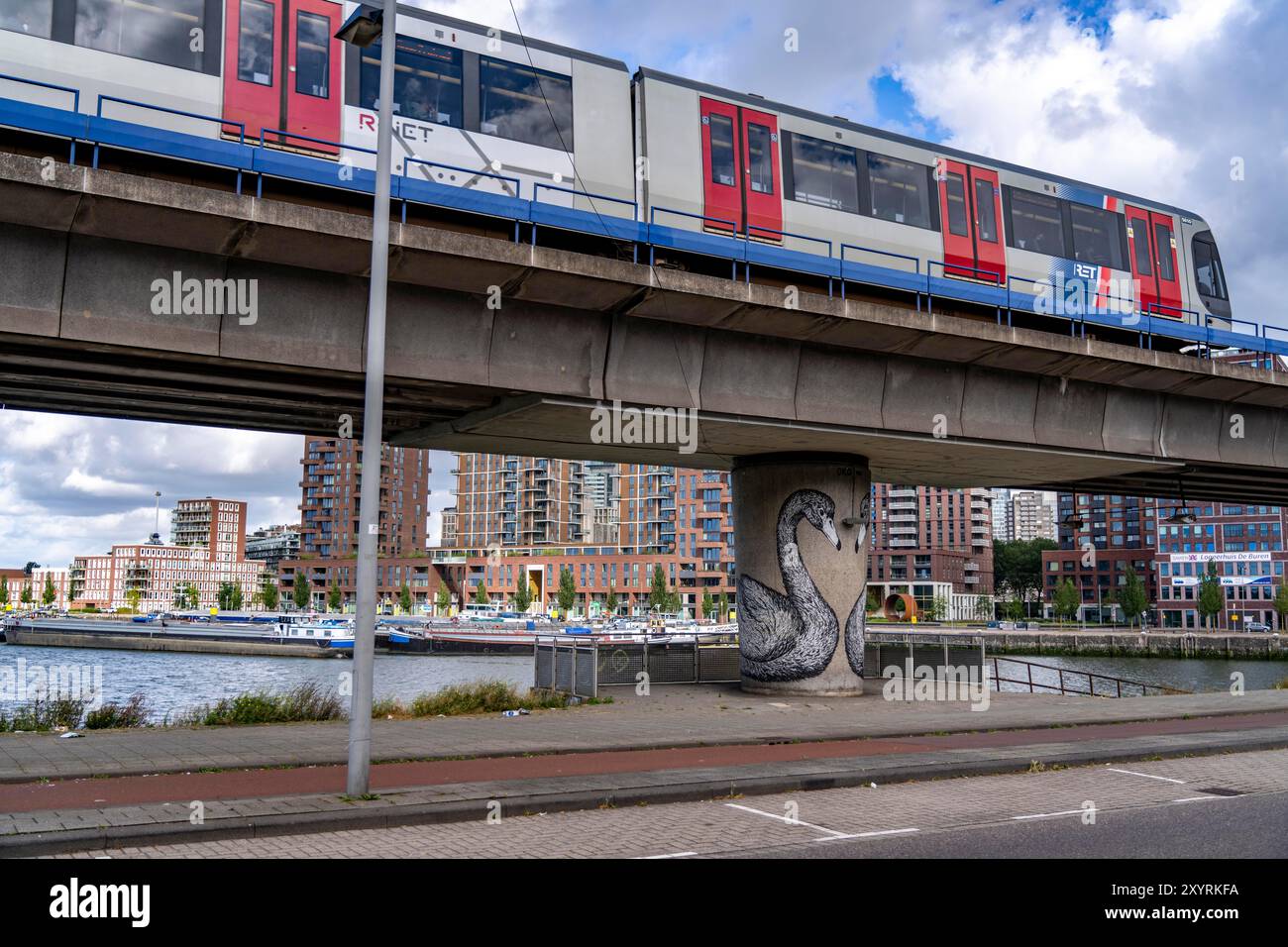 Bridge for the metro line, harbor basin of the Maashaven, residential ...