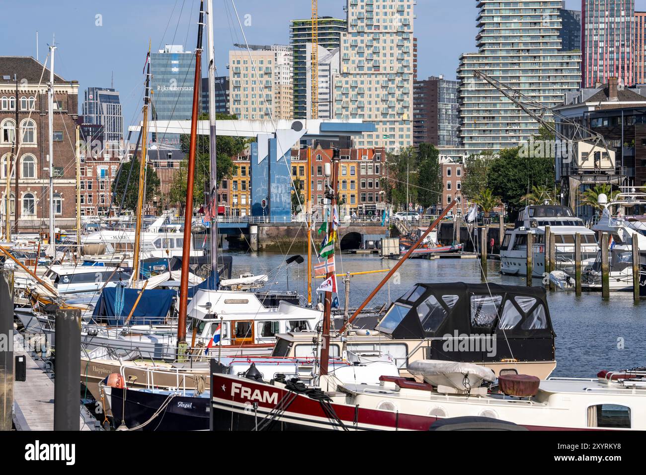 Rotterdam Marina, behind high-rise buildings in the Maritiem District ...