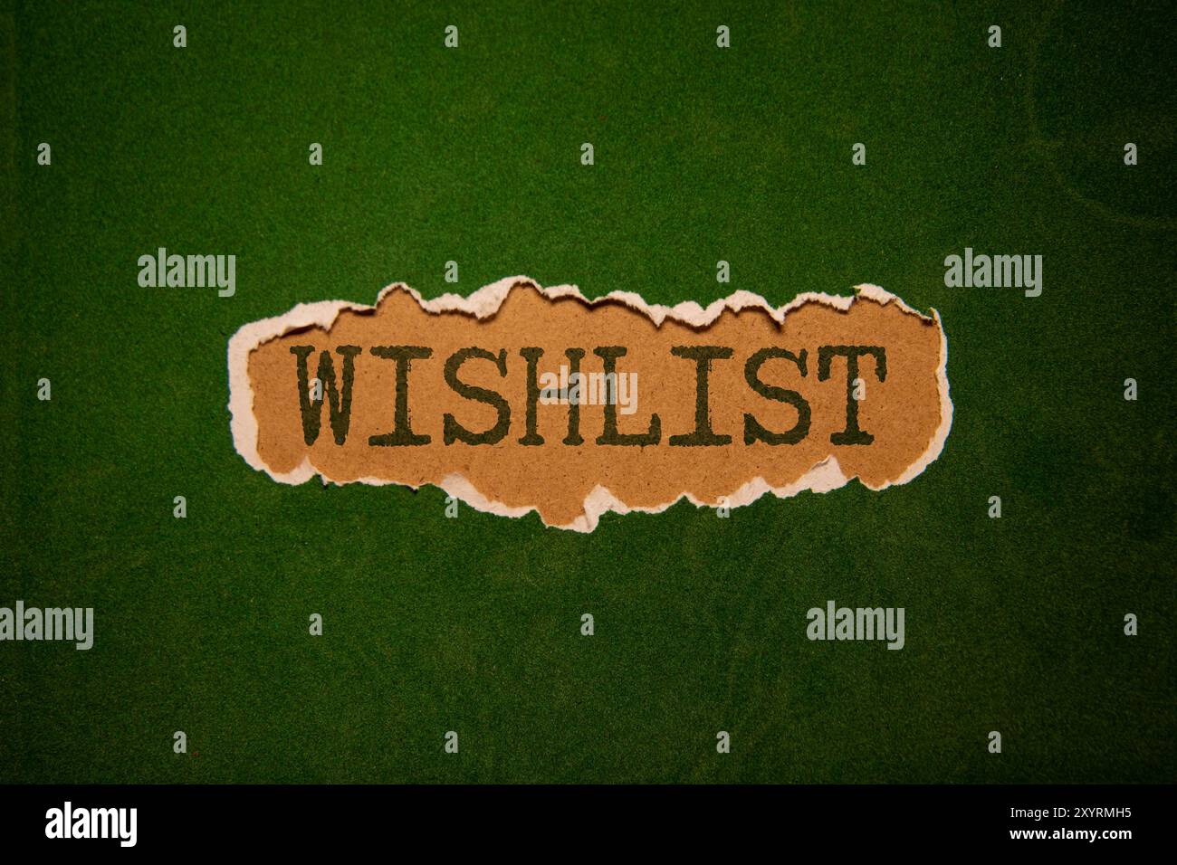 Torn paper with words WISHLIST Stock Photo - Alamy