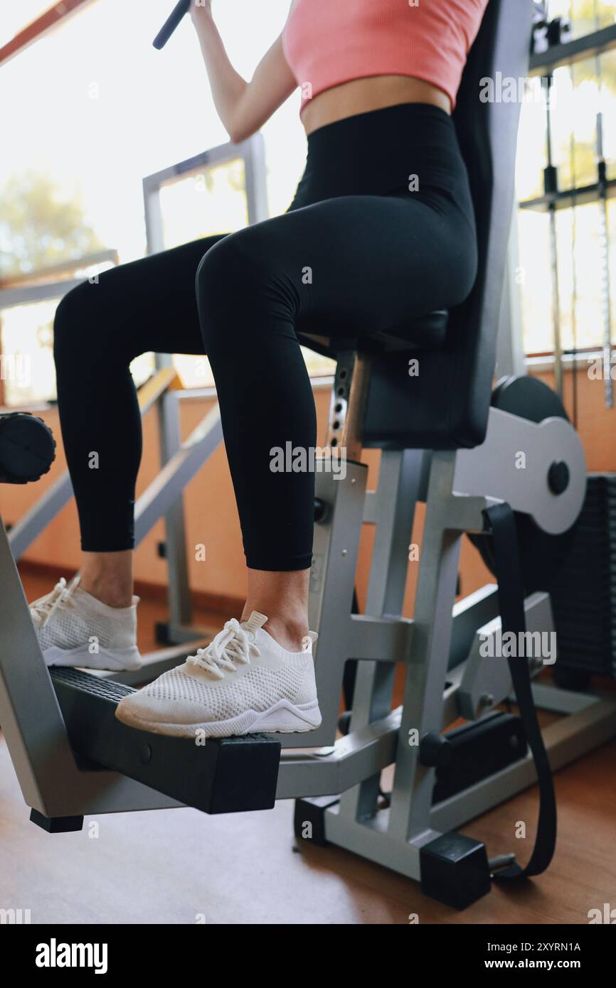 Fit Legs Of A Woman In The Gym Training Stock Photo - Alamy