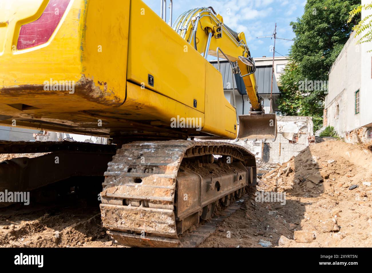 Process of demolition of old building dismantling. Excavator breaking ... Process of demolition of old building dismantling. Excavator breaking ...