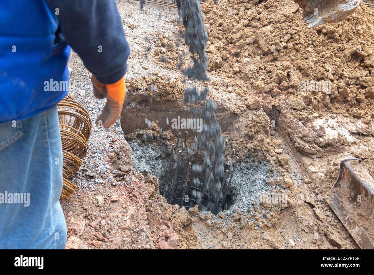 Concreting the foundation piles for the new construction site ...