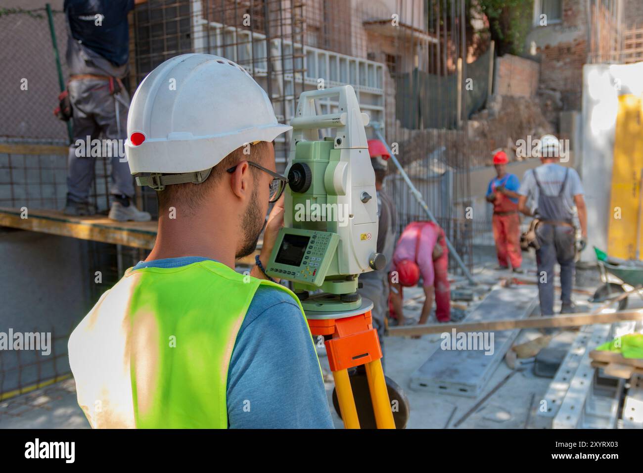 Surveying measuring equipment level theodolite on tripod at ...