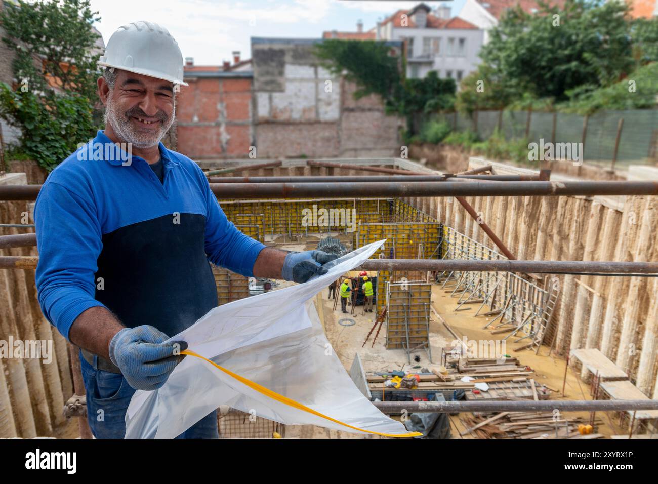 Engineer checking blueprint work hi-res stock photography and images ...