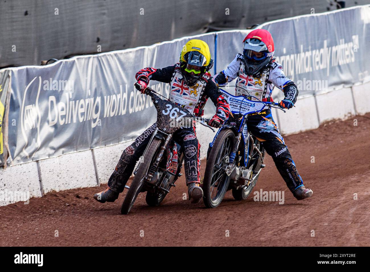 Charlie Luckman (125cc) in Yellow tangles with Reuben Marsh (125cc) in ...