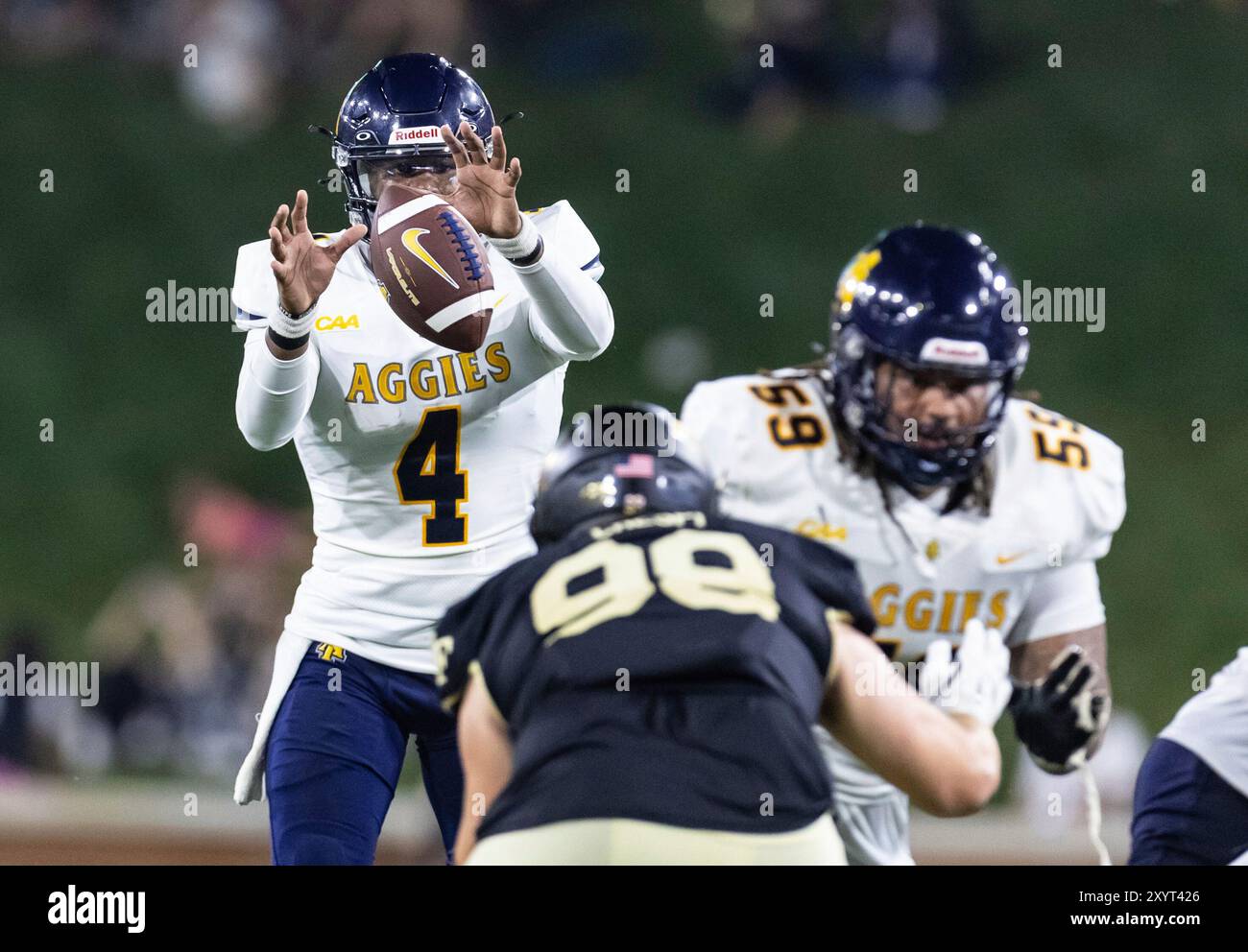 August 29, 2024: North Carolina A&T senior Justin Fomby (4) takes snap ...