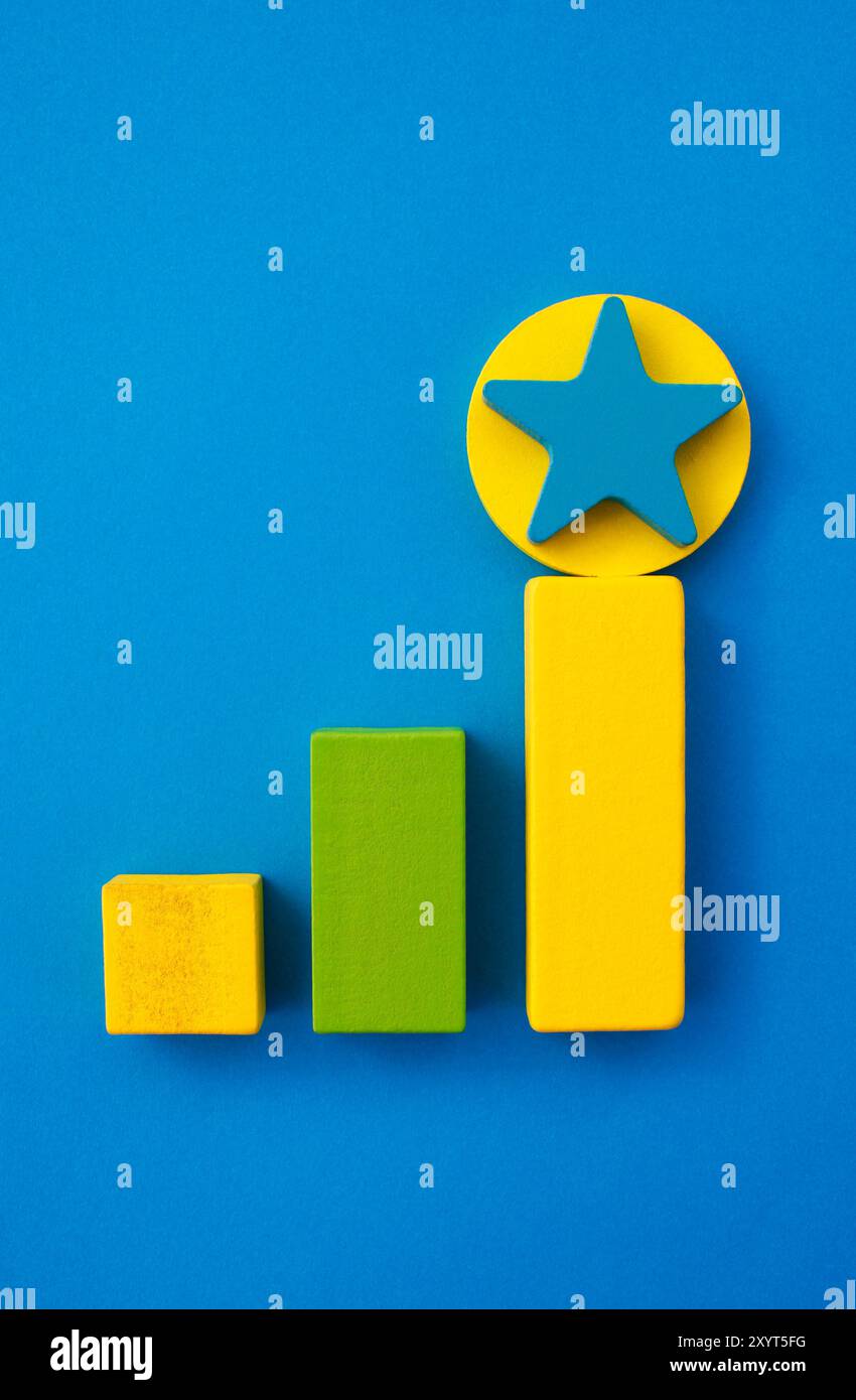 Bar graph with success represented with a star Stock Photo - Alamy