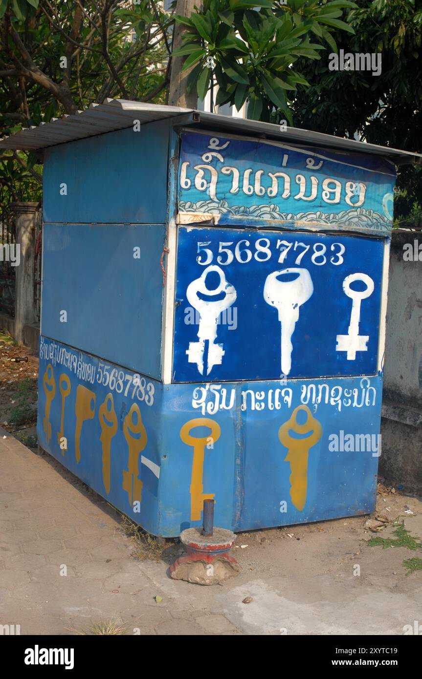 Key Cutting advert on small hut, Vientiane, Laos Stock Photo - Alamy