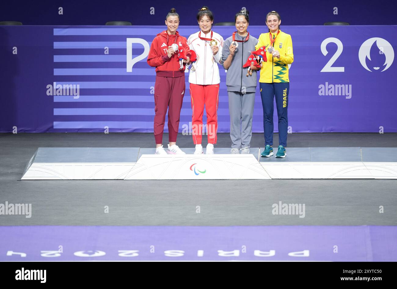 Paris, France. 30th Aug, 2024. Gold medalist Li Yujie (2nd L) of China ...