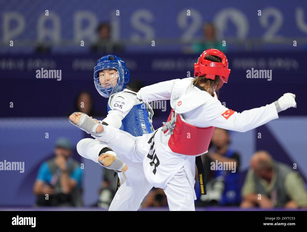 Paris, France. 30th Aug, 2024. Li Yujie (L) of China and Gamze Gurdal ...