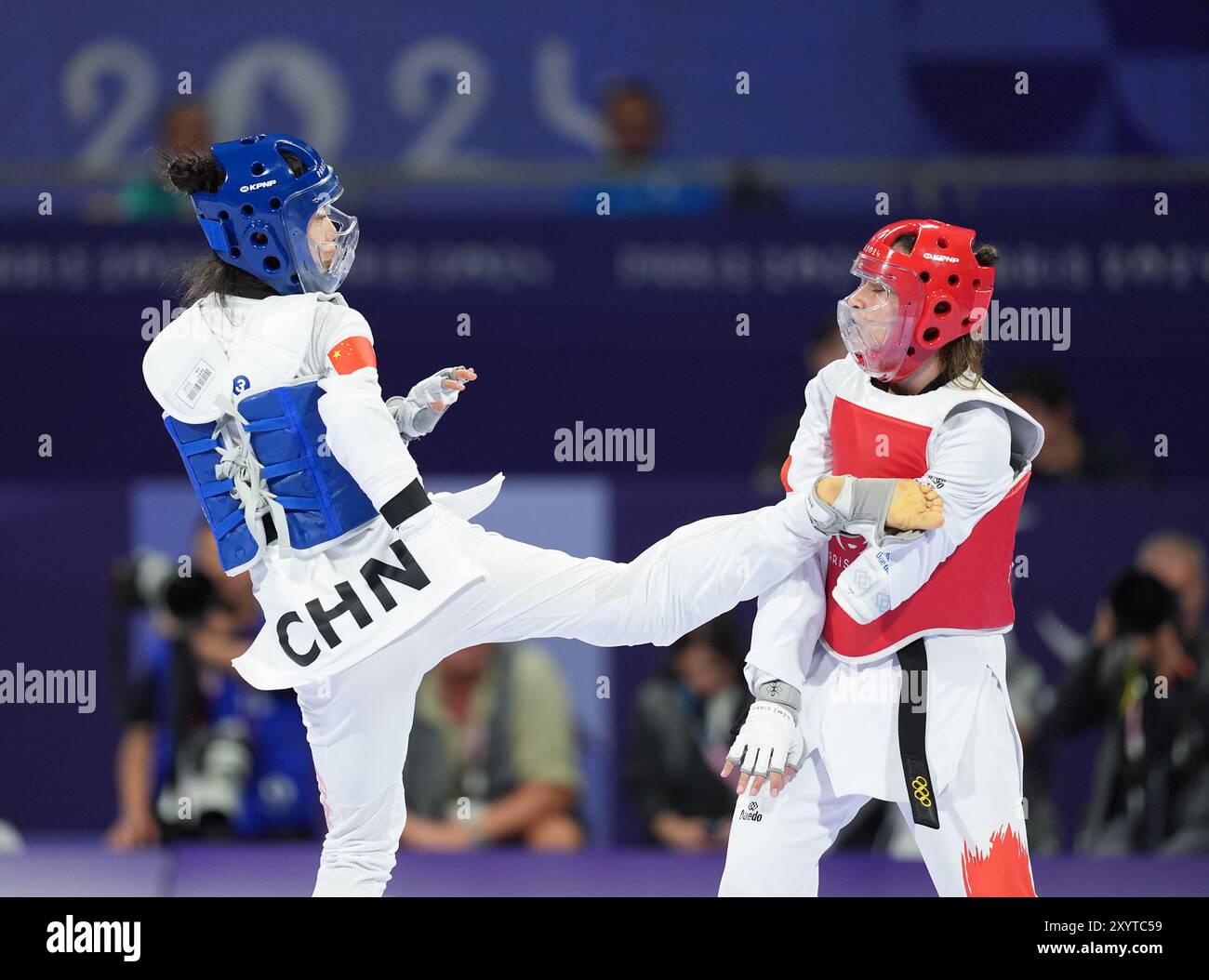 Paris, France. 30th Aug, 2024. Li Yujie (L) of China and Gamze Gurdal ...