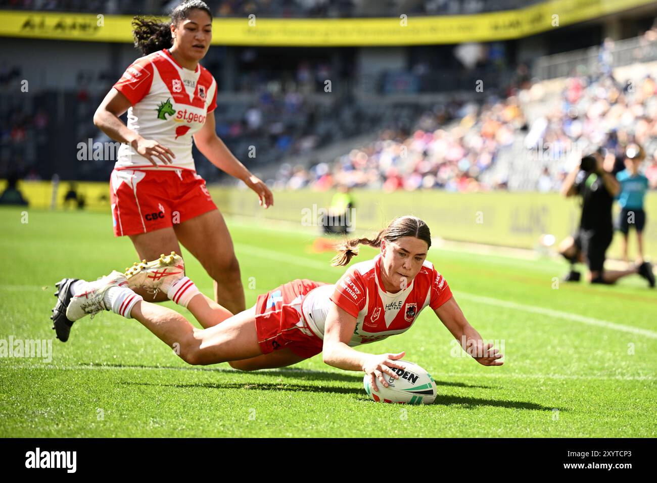 Sydney, Australia. 31st Aug, 2024. Ella Koster of the Dragons dives for ...