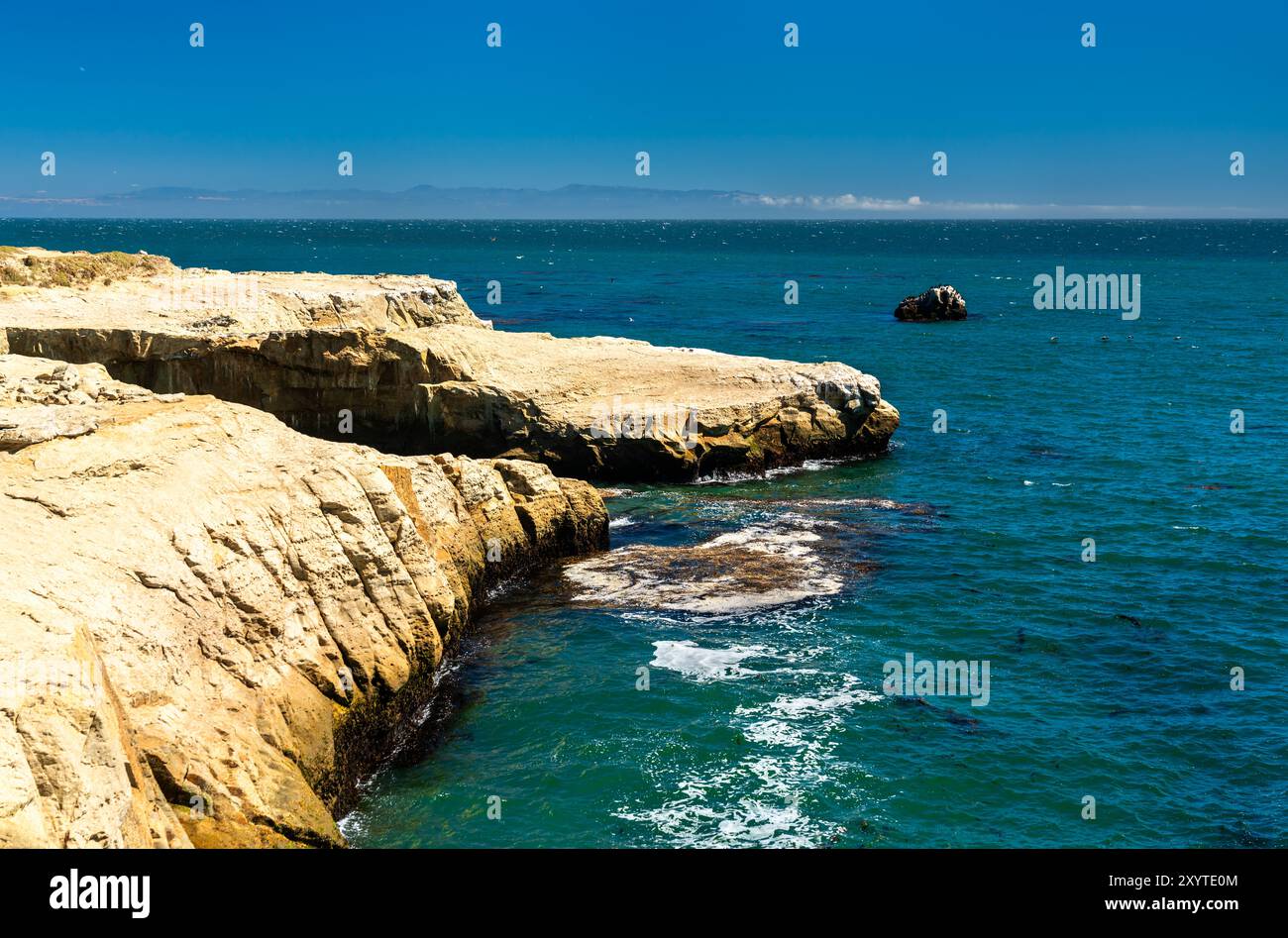 Rocky Ocean Cliffside with Clear Blue Water in Santa Cruz - California ...