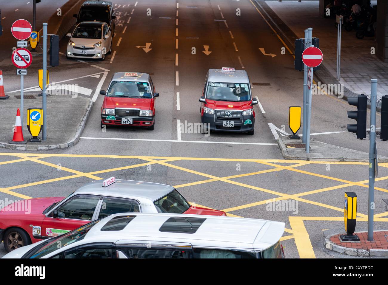 Hong Kong, China - July 03, 2024 : Street intersection with yellow ...