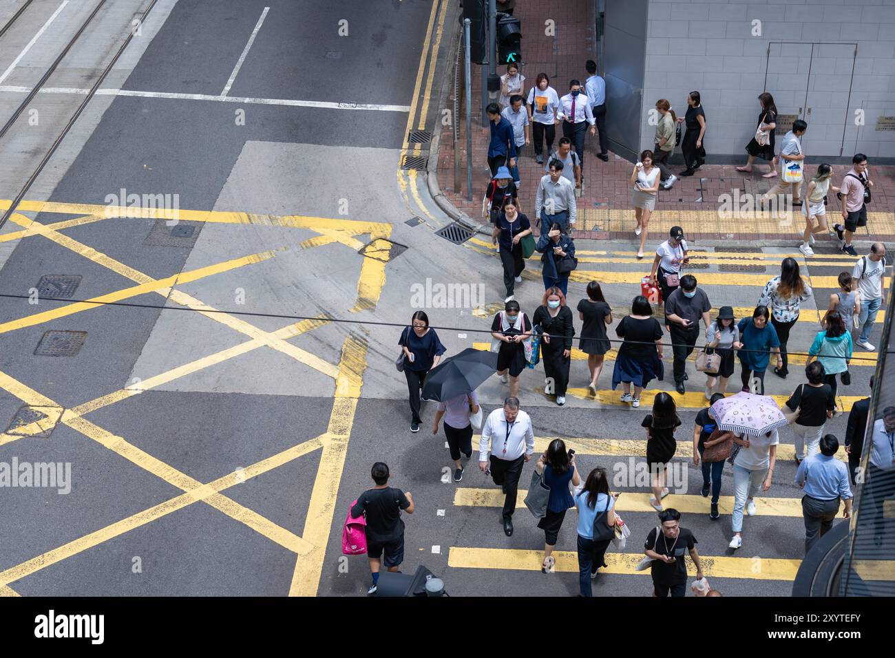 Hong Kong, China - July 03, 2024 : A busy street corner in a bustling ...