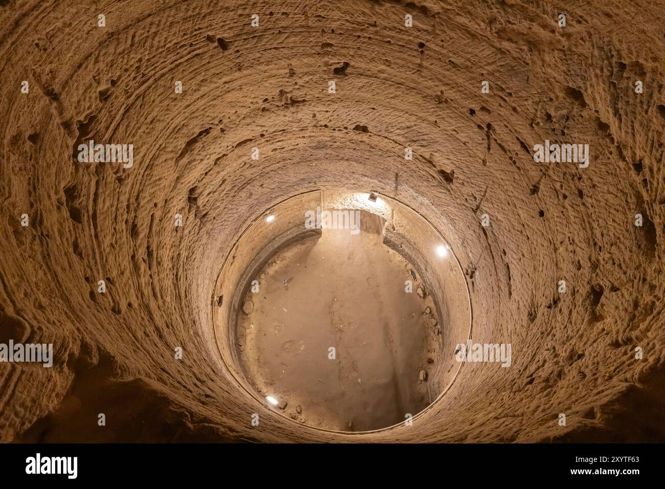 Catacombs of Kom el Shoqafa, rock cut vertical circular hole with ...