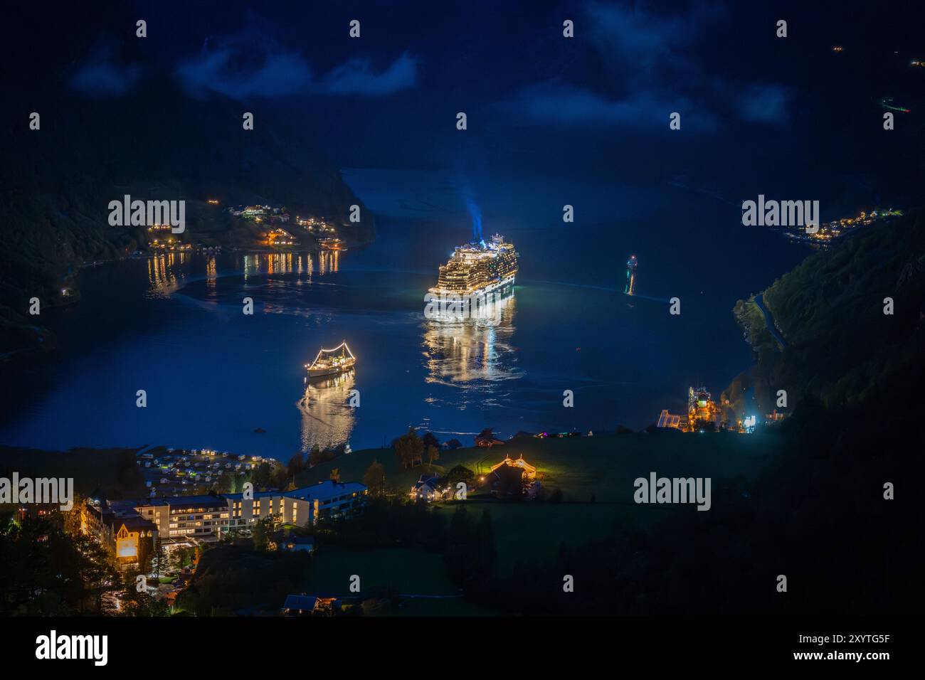 Geiranger 20240830. The royal ship Norway lies next to the cruise ship ...