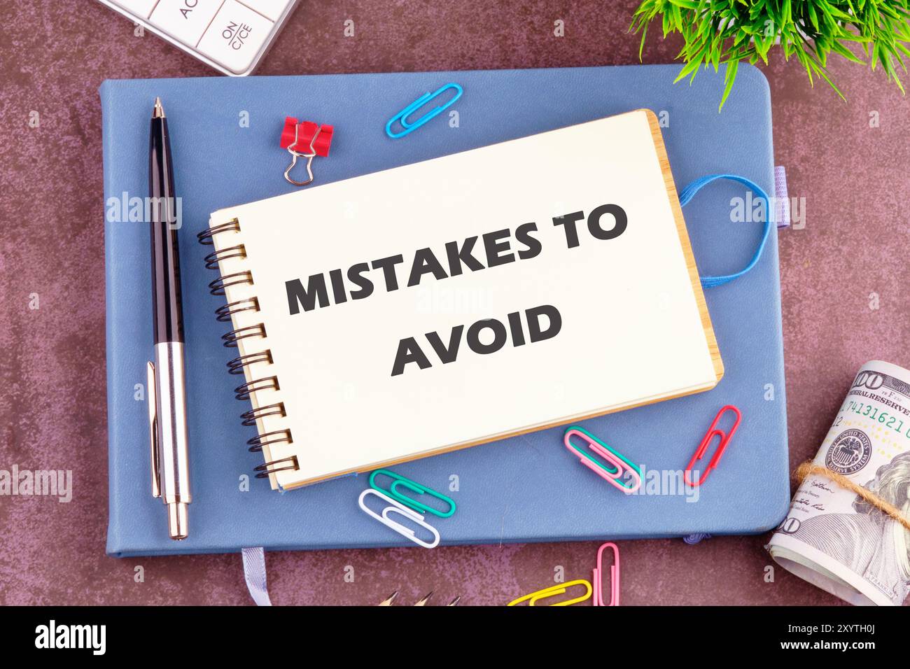 MISTAKES TO AVOID, text in the notebook. View from above Stock Photo ...