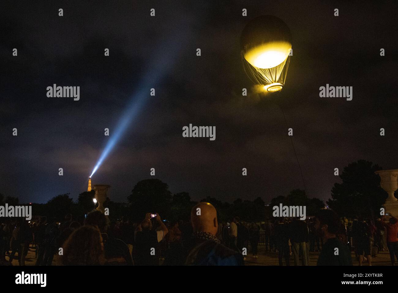 The Paralympic cauldron is floating above the gardens of Tuileries ...