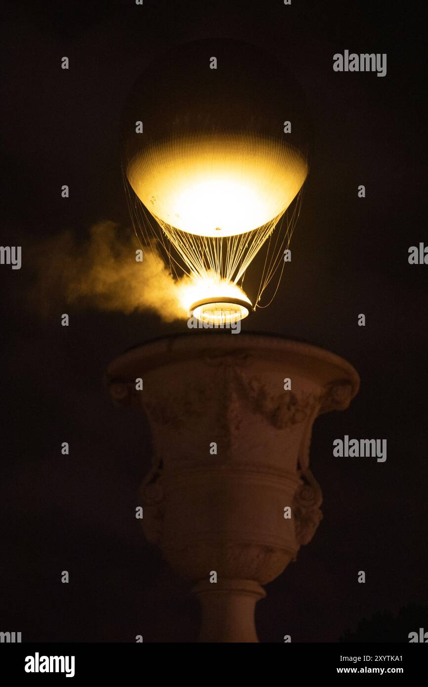 The Paralympic cauldron is floating above the gardens of Tuileries ...