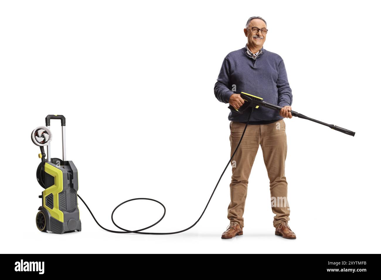 Mature man using a high pressure washer machine isolated on white ...