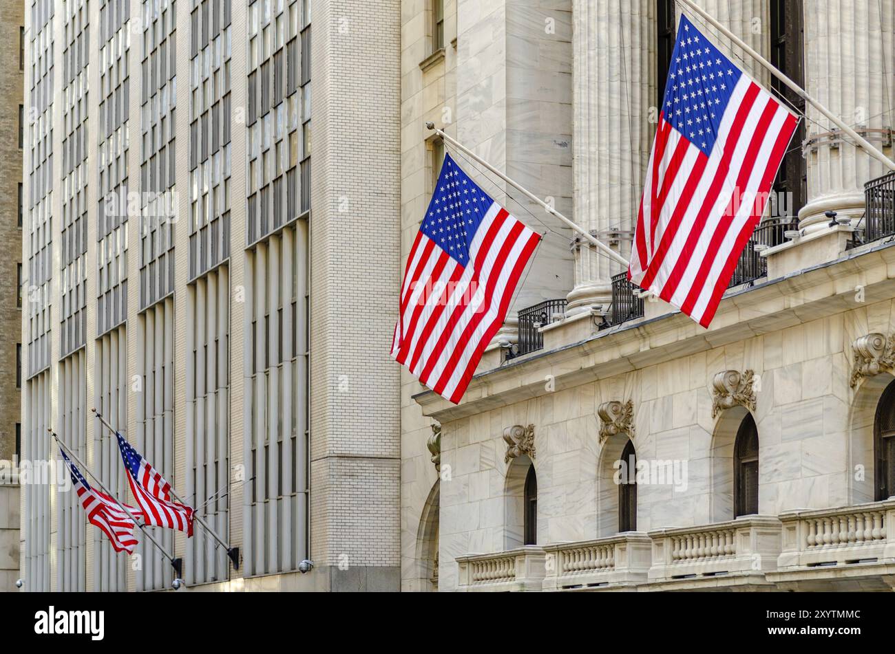 American Flags hanging down at New York Stock Exchange, Building with ...