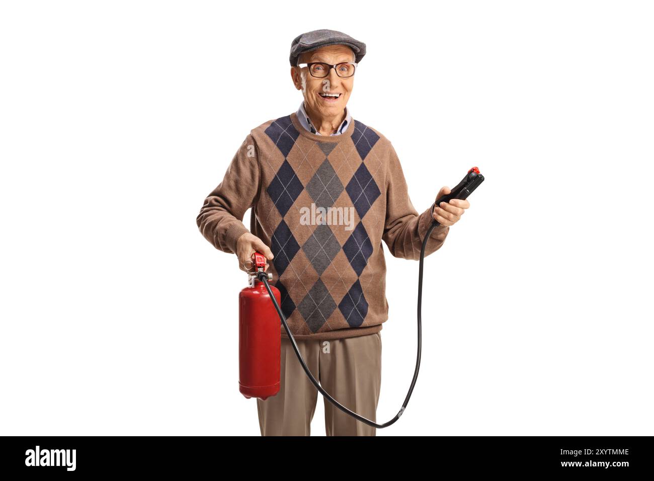 Elderly man holding a fire extinguisher isolated on white background ...