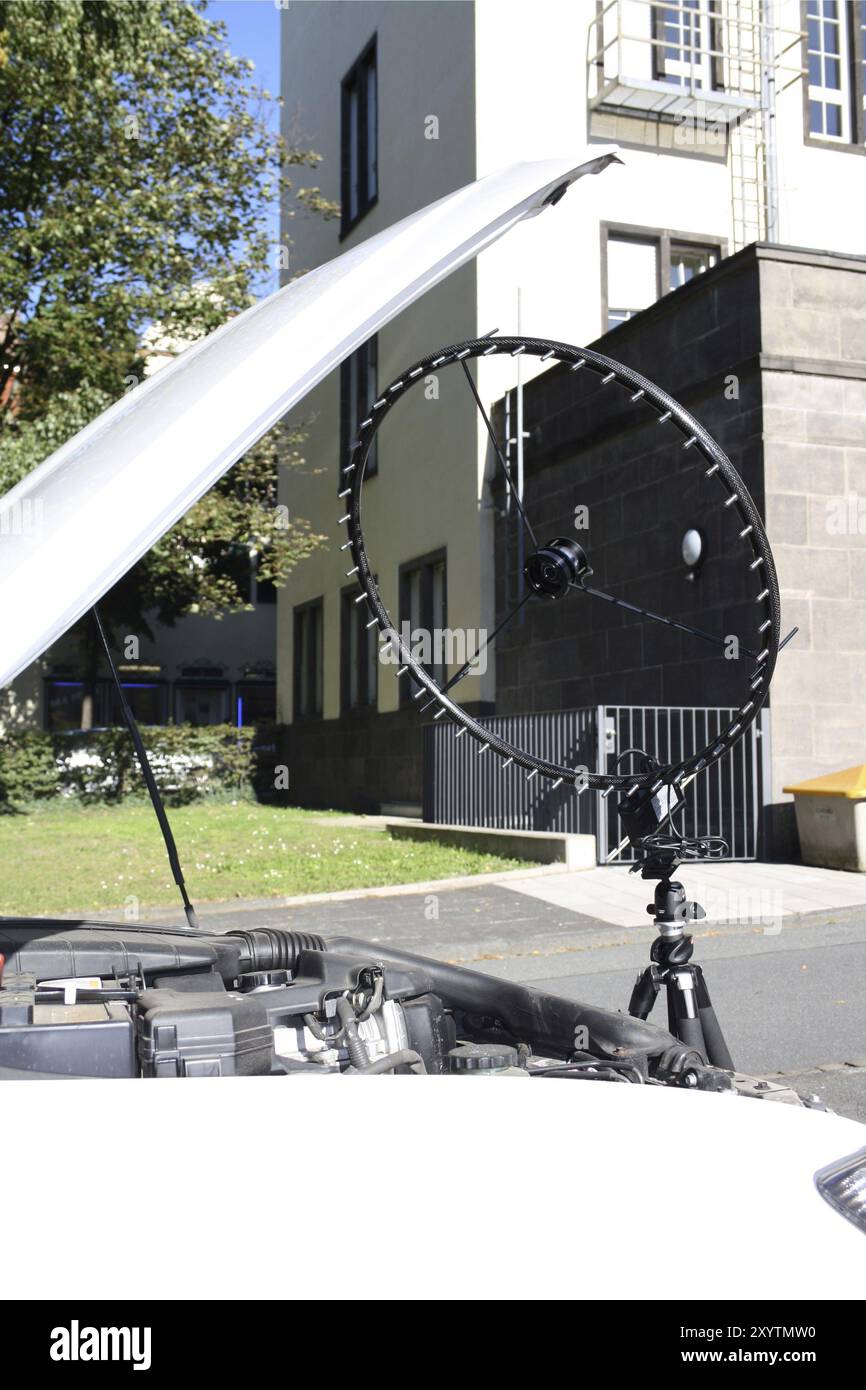 A microphone array of an acoustic camera set up to measure the engine ...