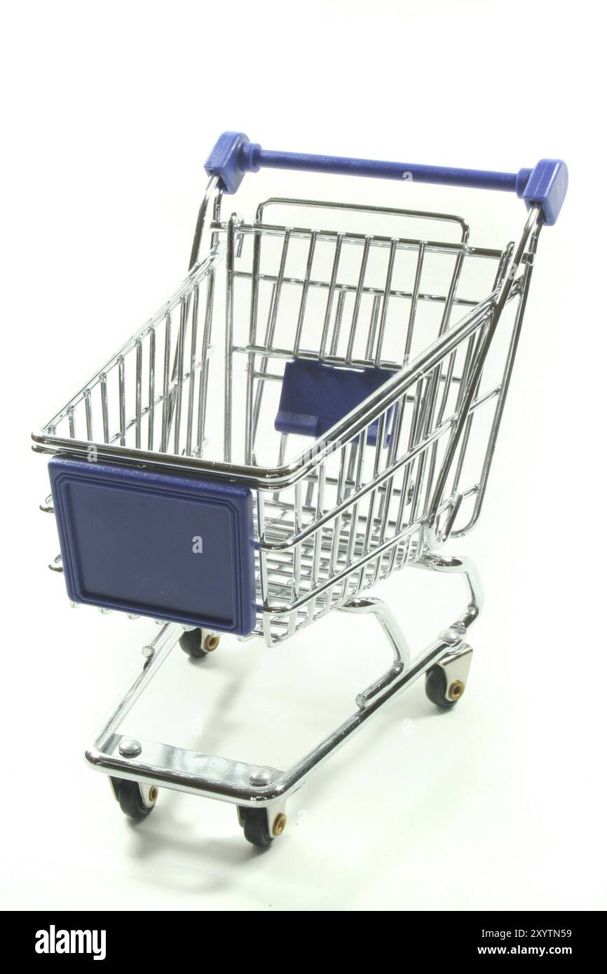 Shopping trolley in front of a white background Stock Photo - Alamy