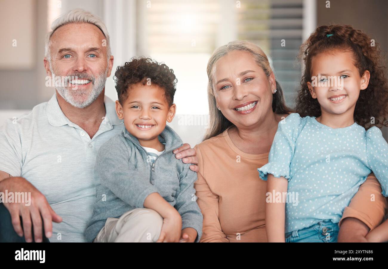 Happy, portrait and grandparents with children on sofa in home for ...