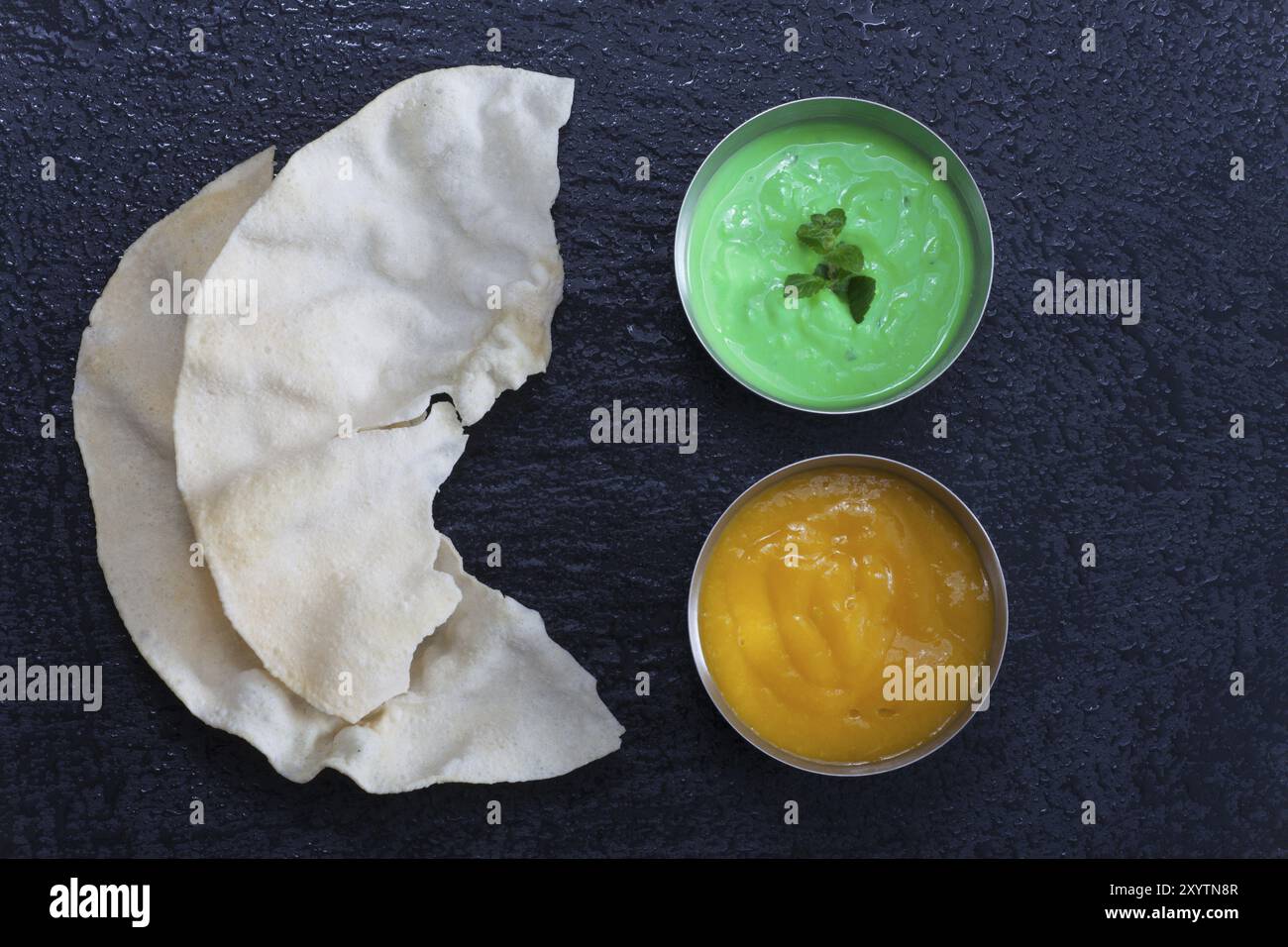 Indian papadams with dips Stock Photo - Alamy