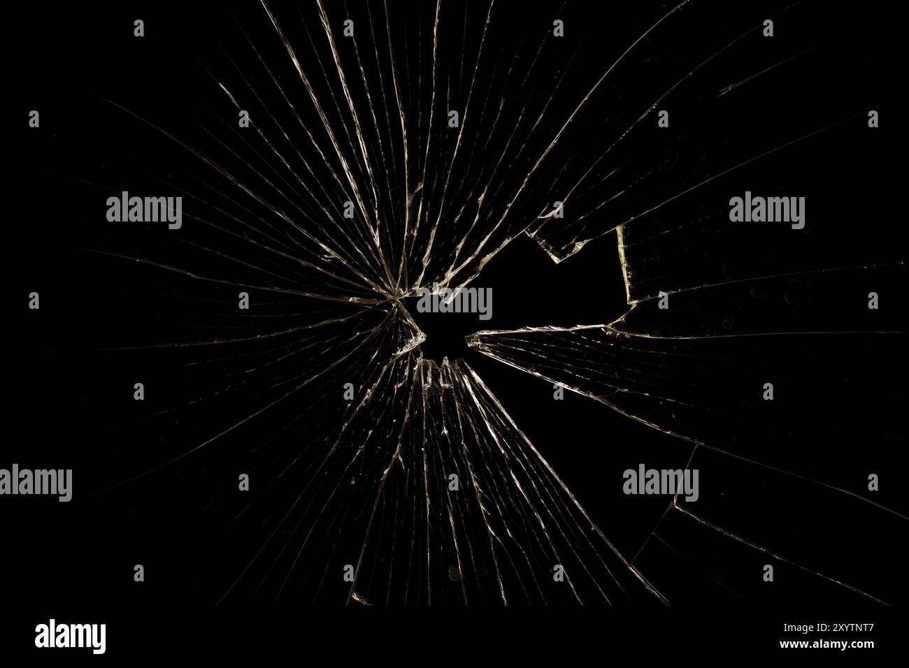 Broken glass isolated on black background Stock Photo - Alamy