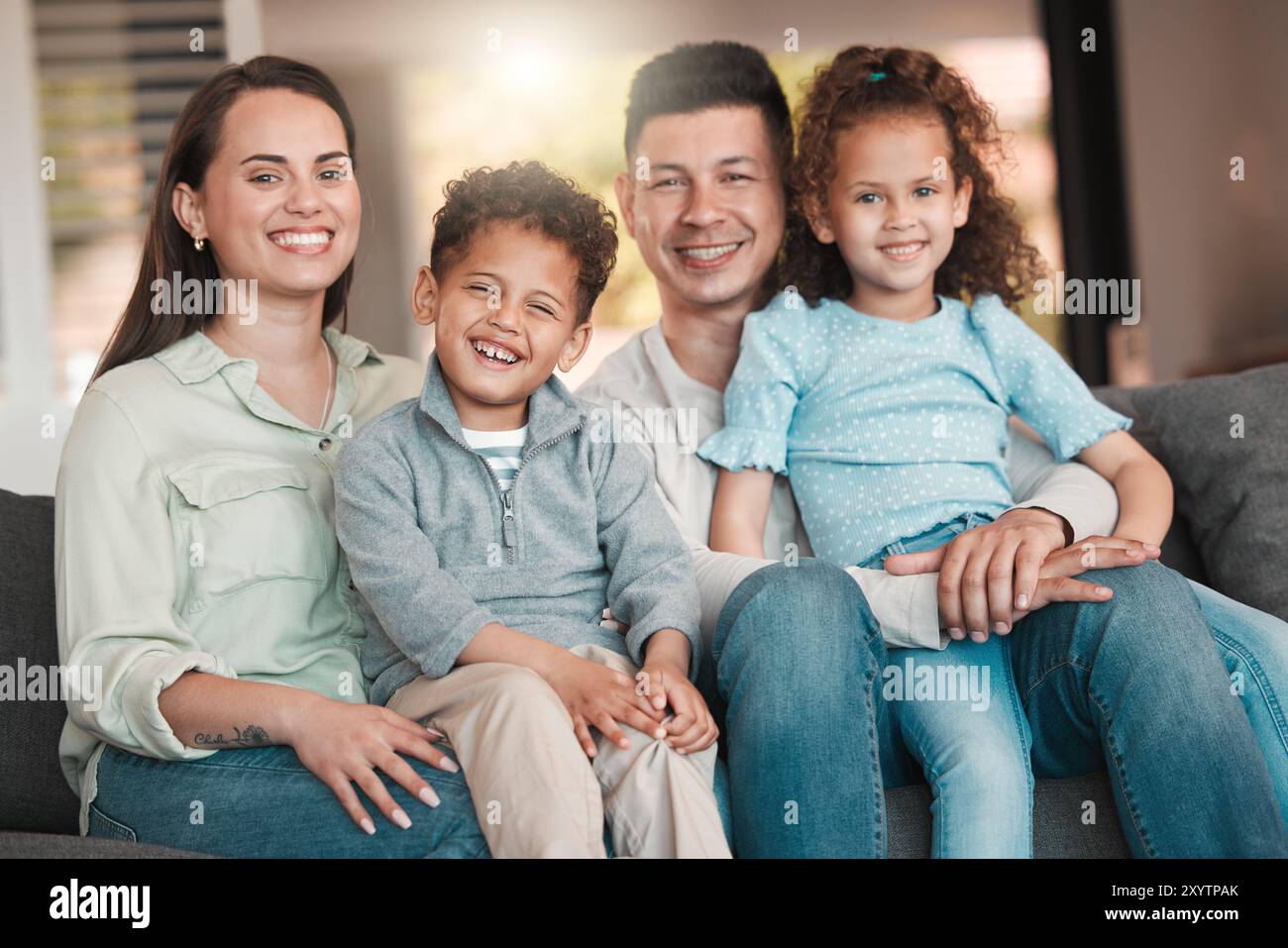 Parents, happy children and hug in home portrait, family connection and ...
