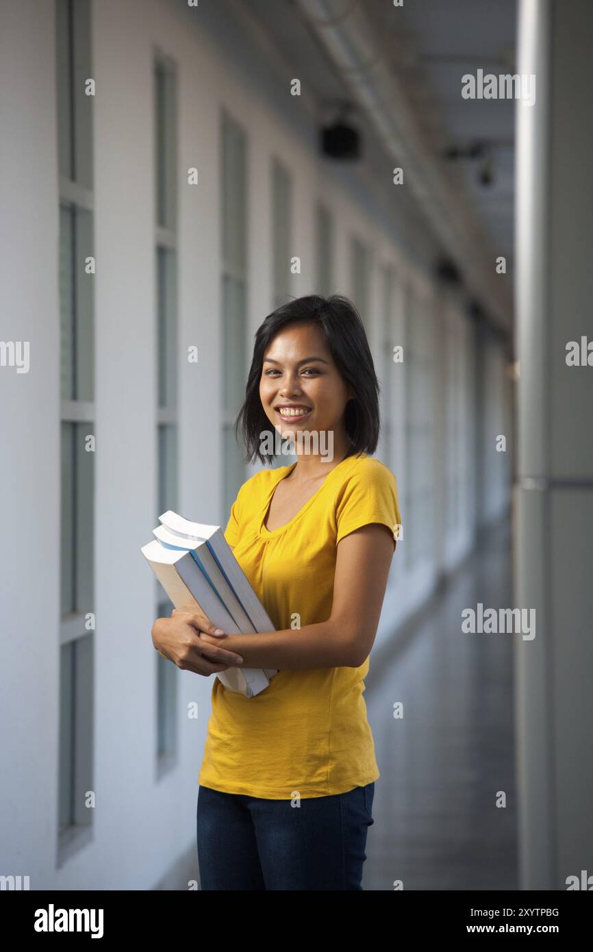 Asian female student stands hi-res stock photography and images - Alamy