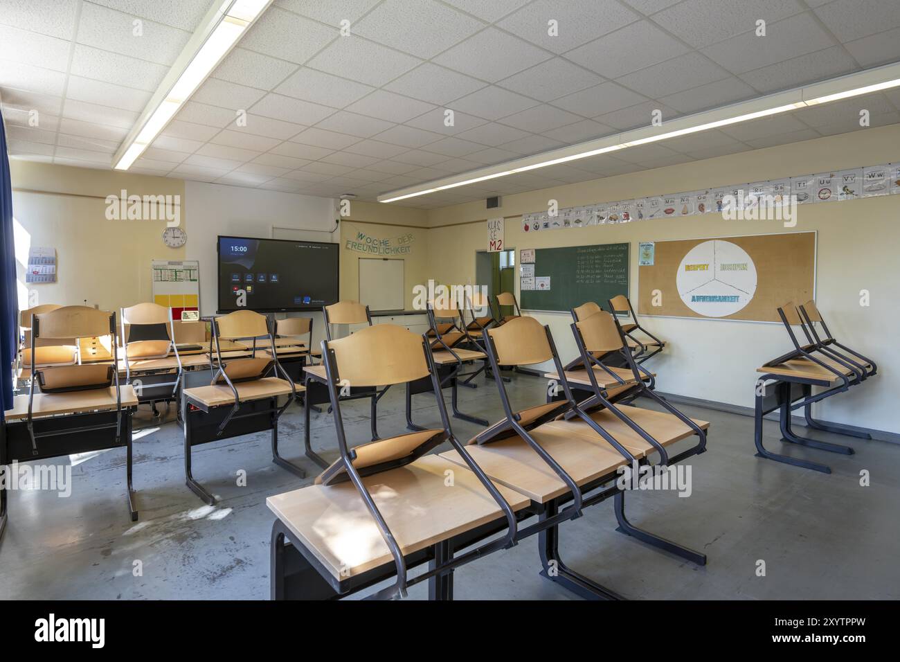 Classroom of a fourth grade, after school, the building is older but in ...