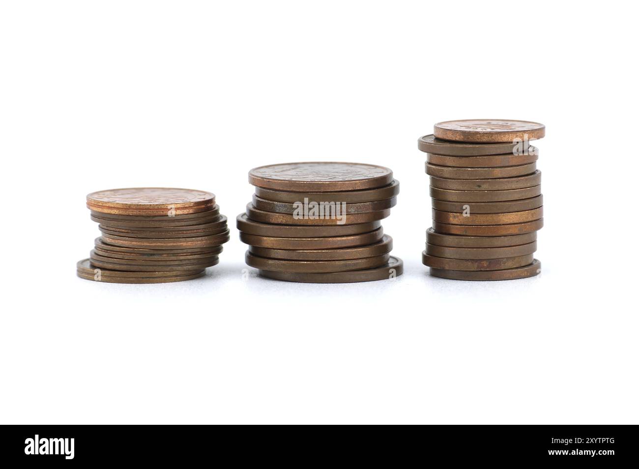 Stacks of coins ordered by size from largest to smallest and arranged ...