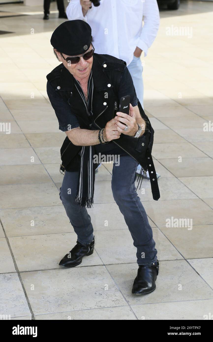 Drummer Mikkey Dee of the hard rock band Scorpions receives a yellow ...