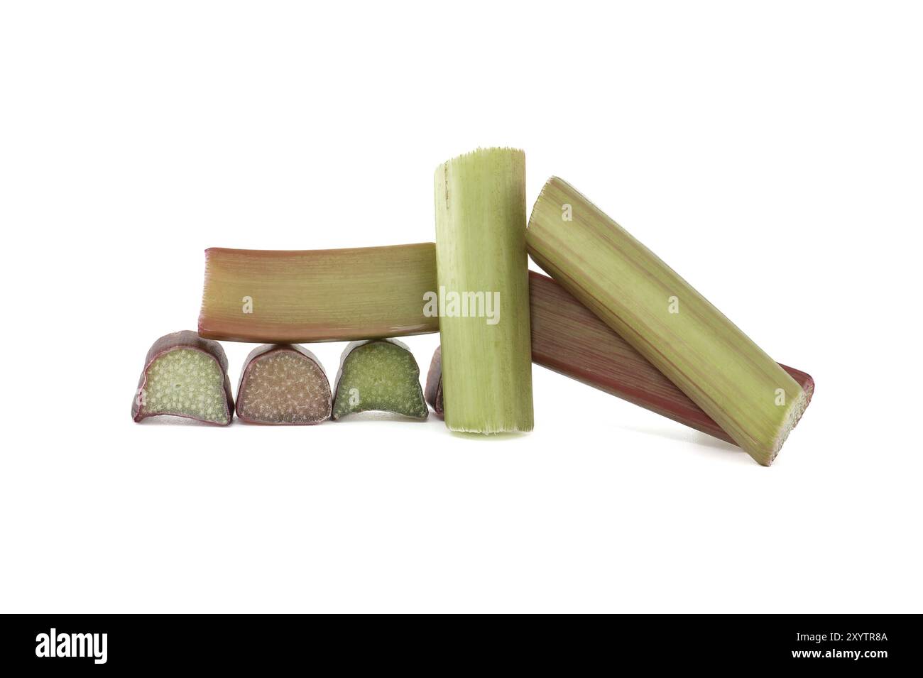 Group of rhubarb pieces in various shapes and sizes arranged in a ...