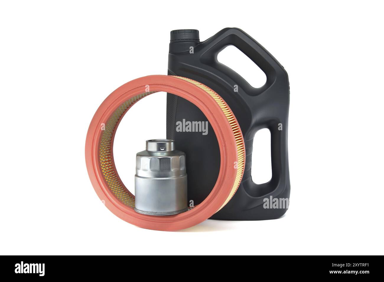 Black plastic oil canister, orange air filter and silver metal oil ...