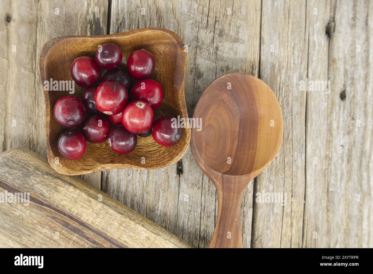 Rustic kitchen scene with fresh cranberries a symbol of health and ...