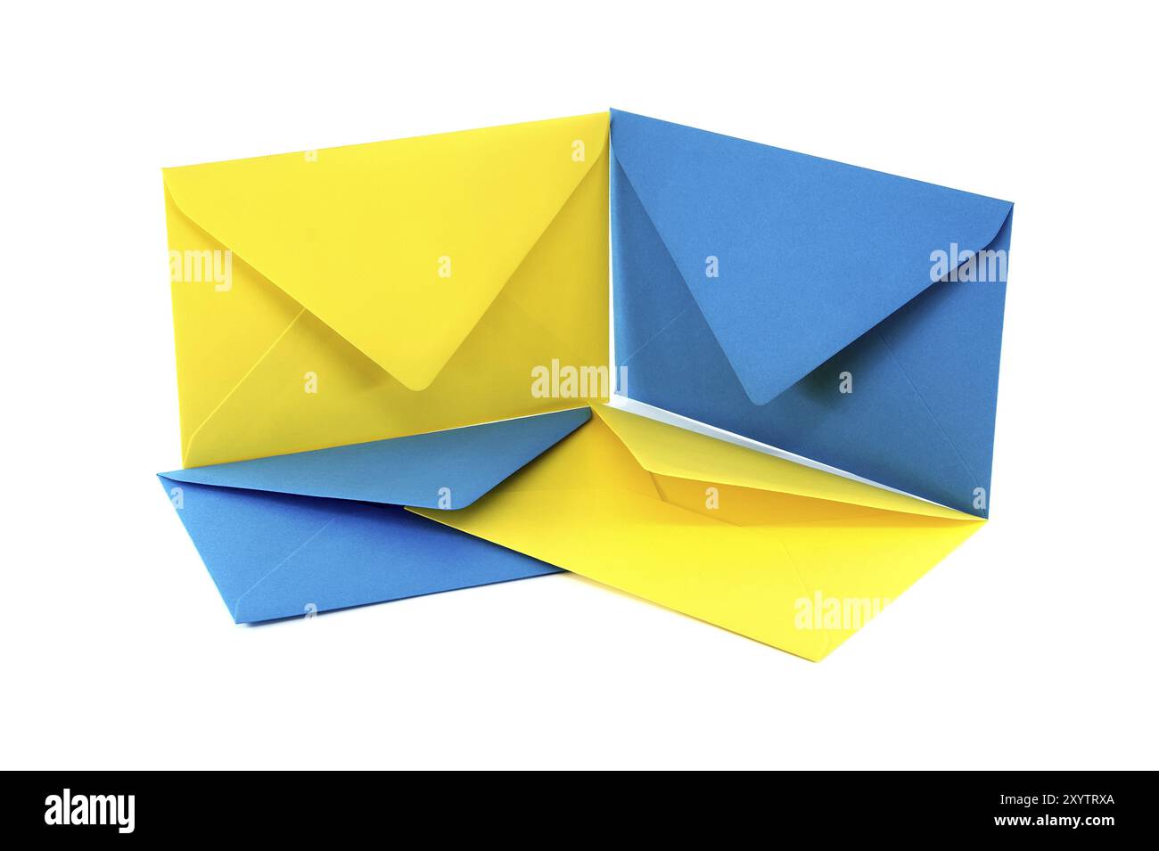 Four blue and yellow paper envelope arranged in a square formation ...