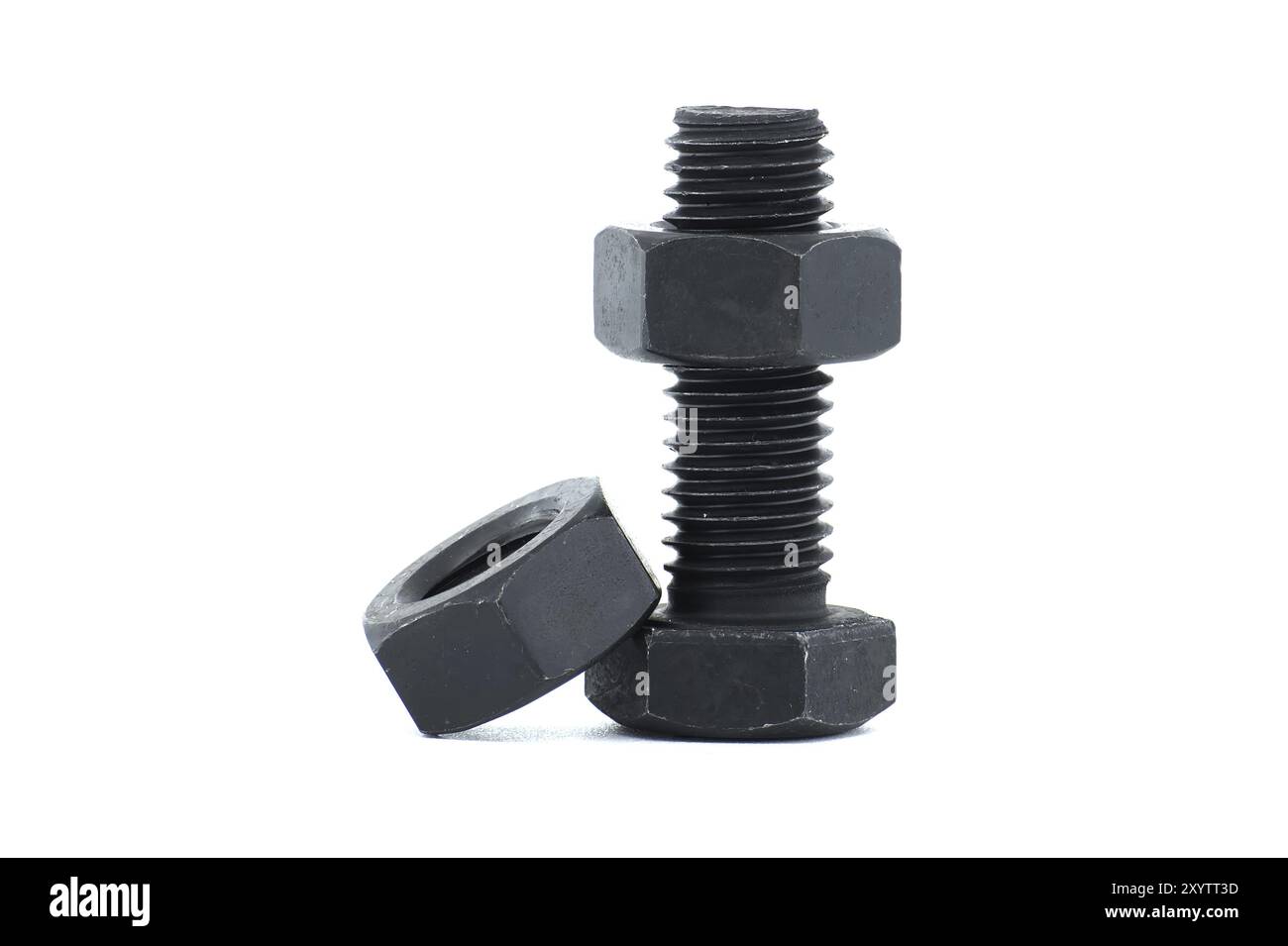Black metal hexagonal bolt and nut shown in close-up isolated on white ...