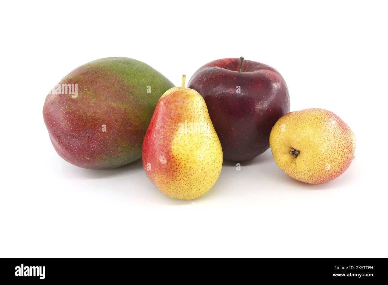 Fresh whole multicolored ripe mango, pears and red apple fruits ...