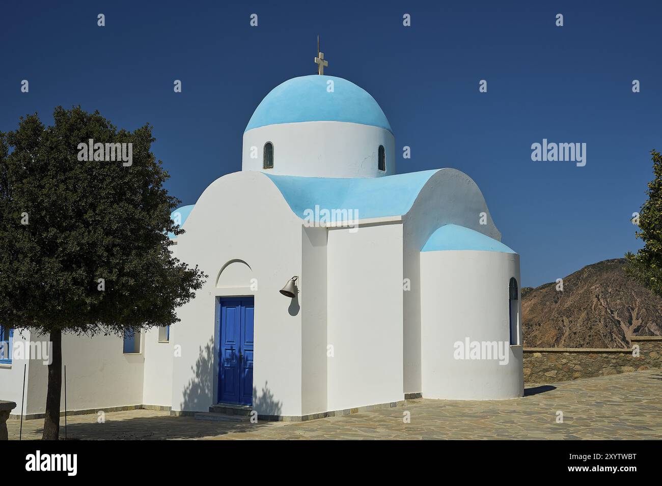 Orthodox church with white-blue dome, situated in a sunny spot ...