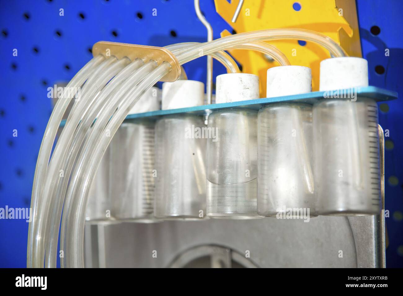 A close-up diagnostic stand with fuel flasks for checking the flow rate ...