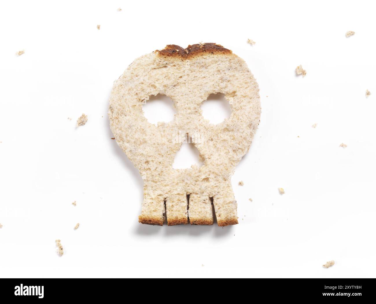 Skull made of bread isolated on white background Stock Photo - Alamy