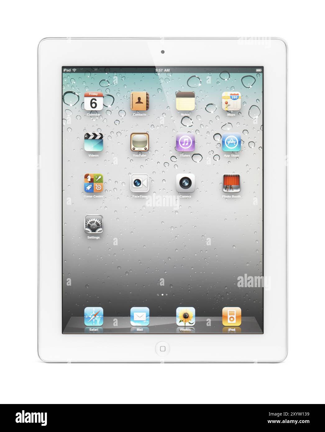 White Apple iPad 2 tablet computer with desktop icons on its display ...