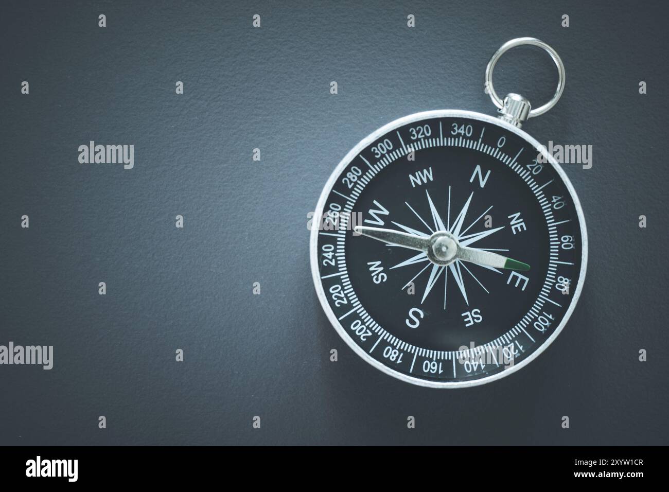 Close up of compass on an office desk, business innovation Stock Photo ...